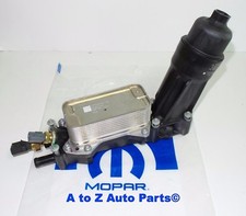Laying the oil cooler VAG Genuine OEM Part 059117070A for sale online ...